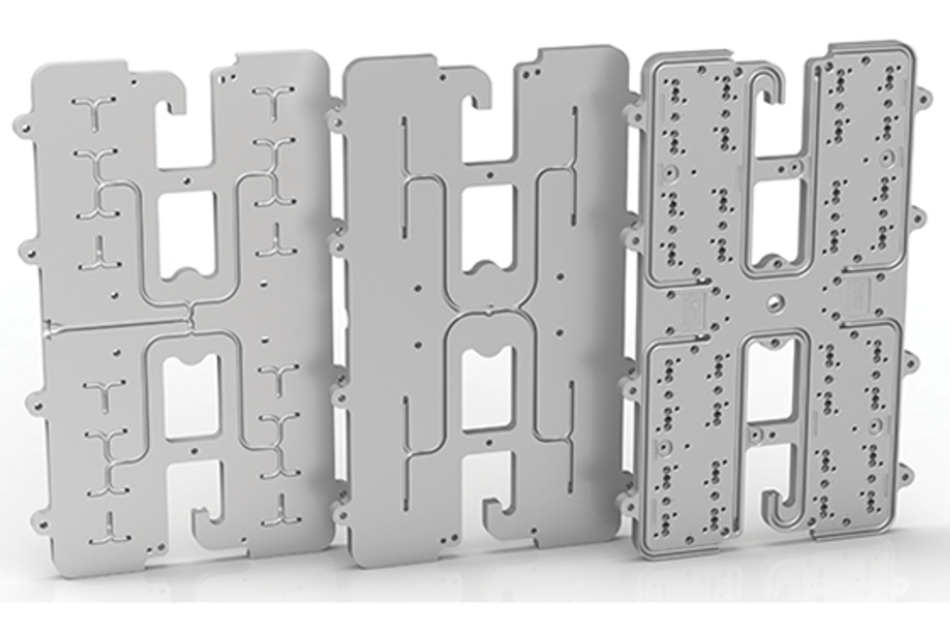 Polyshot uses plate fusion for 2-shot manifold | Plastics Machinery ...