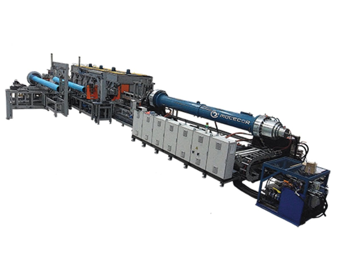 Molecor machine makes oriented PVC pipe | Plastics Machinery ...