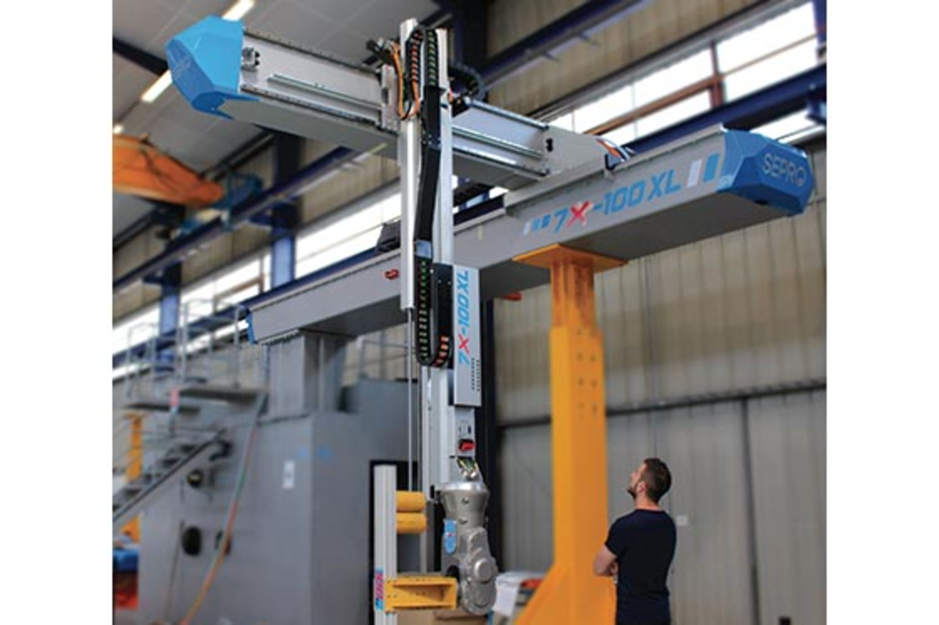 Sepro robot provides precision | Plastics Machinery & Manufacturing