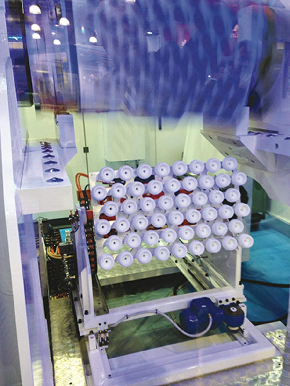 Polytype machine rotates mold instead of tilting it | Plastics ...