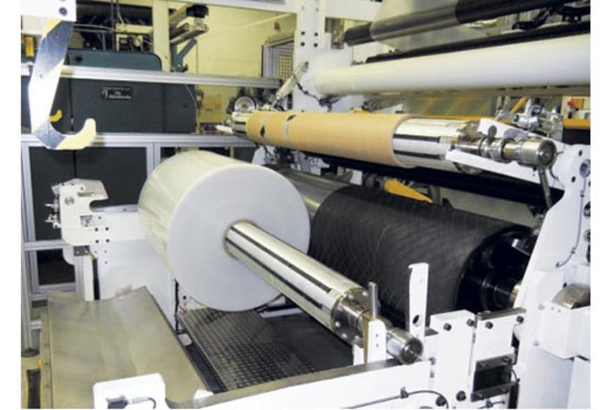 Surface winder adds front and reverse winding | Plastics Machinery ...