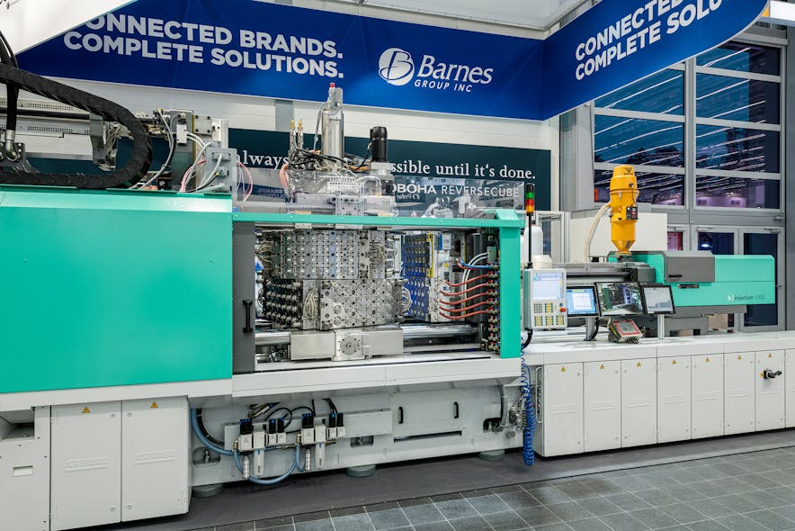 Rotating cube mold speeds cycle times | Plastics Machinery & Manufacturing